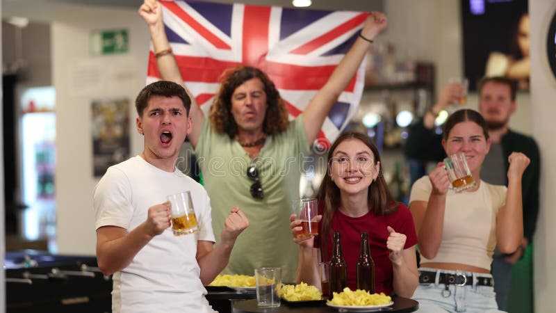 Group of Fans in Bar with British Flag Stock Video - Video of friendly ...
