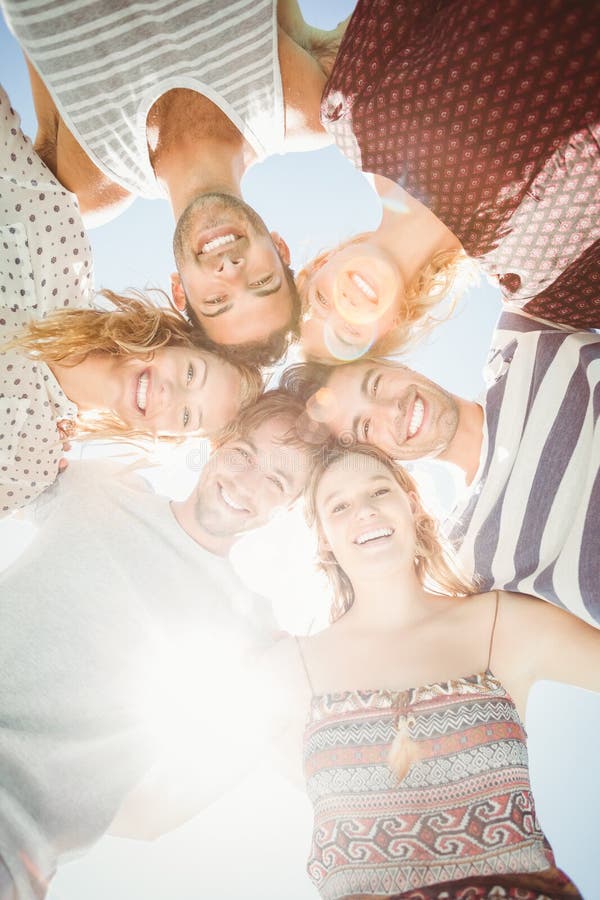 Group of Friends Forming a Huddle Stock Photo - Image of gorgeous ...