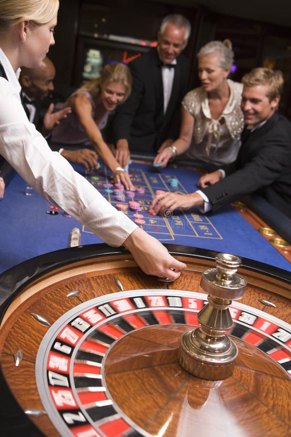 Group of Friends Gambling in Casino Stock Photo - Image of friends ...