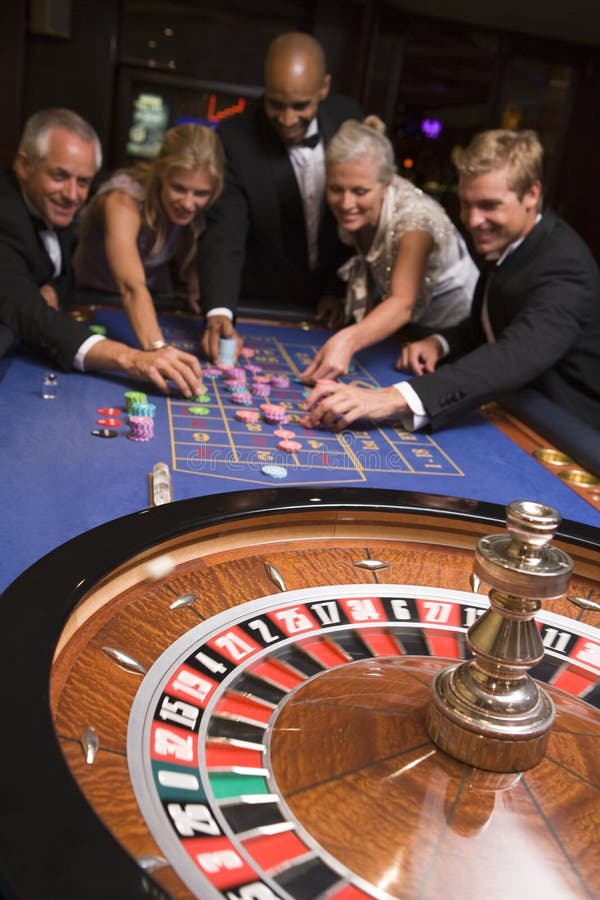 Group of Friends Gambling in Casino Stock Image - Image of gambling ...