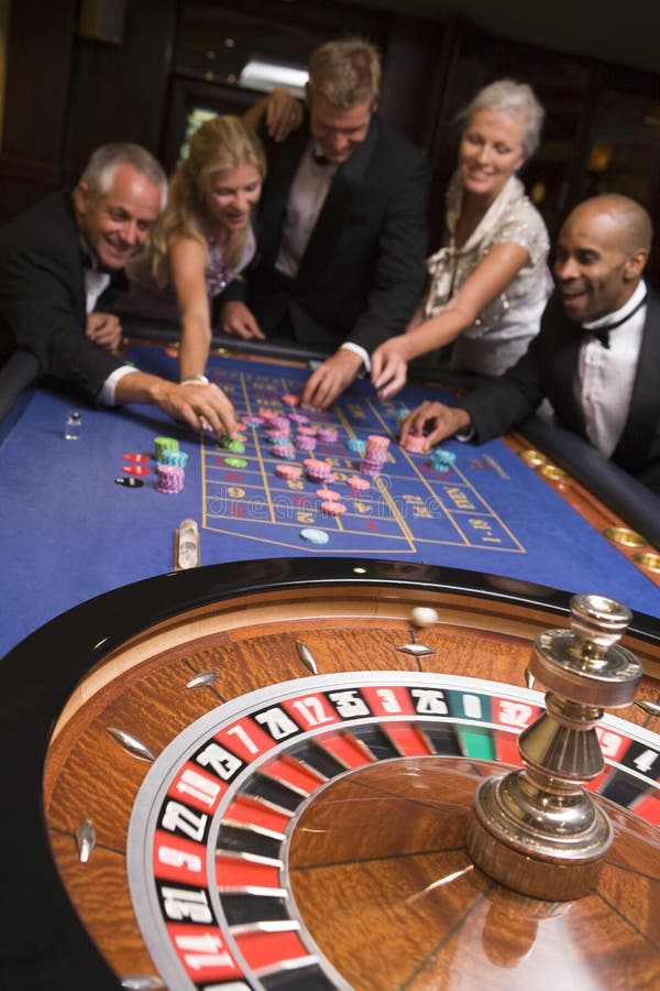 Group of Friends of Gambling in Casino Stock Image - Image of couple ...