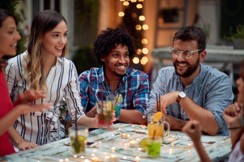 Group of Friends Having a Drink Together Stock Photo - Image of outdoor ...