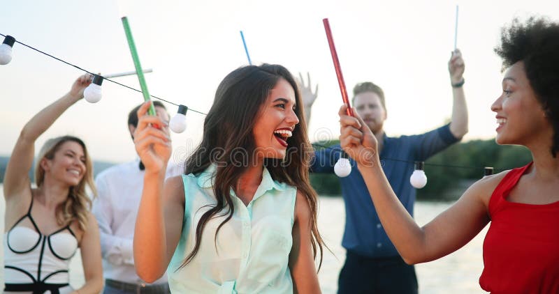 Group of Friends Having Fun and Celebrating Group Gathering Outdoor ...