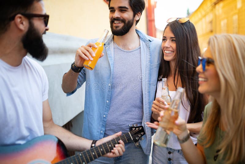 Group of Friends Having Fun and Hanging Out Outdoors Stock Photo ...