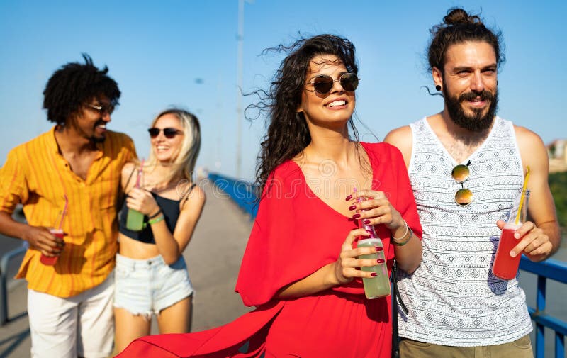 Group of Friends Having Fun and Hanging Out Outdoors Stock Photo ...