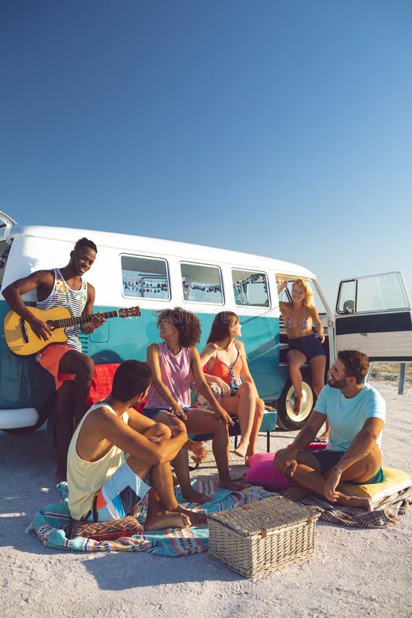 Group of Friends Having Fun Near Camper Van at Beach Stock Image ...