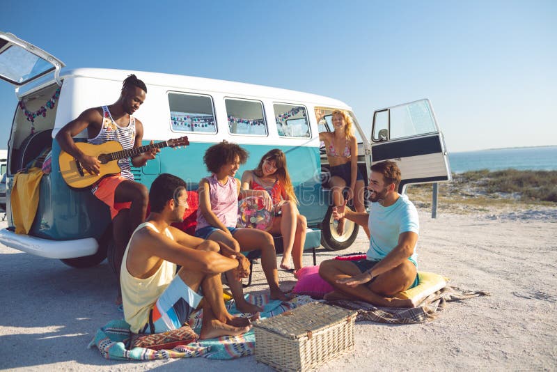 Group of Friends Having Fun Near Camper Van at Beach Stock Image ...