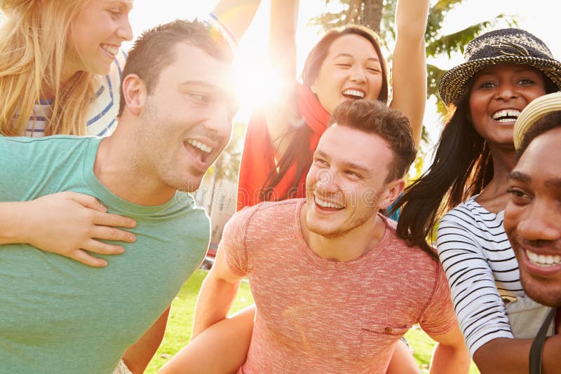 Group of Friends Having Fun in Park Together Stock Image - Image of ...