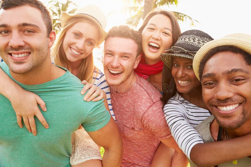 Group of Friends Having Fun in Park Together Stock Photo - Image of ...