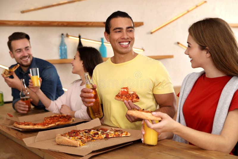 Group of Friends Having Fun Party with Delicious Pizza Stock Image ...