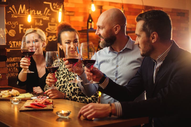 Group of Friends Having Fun Talk Behind Bar Counter in a Cafe Stock ...