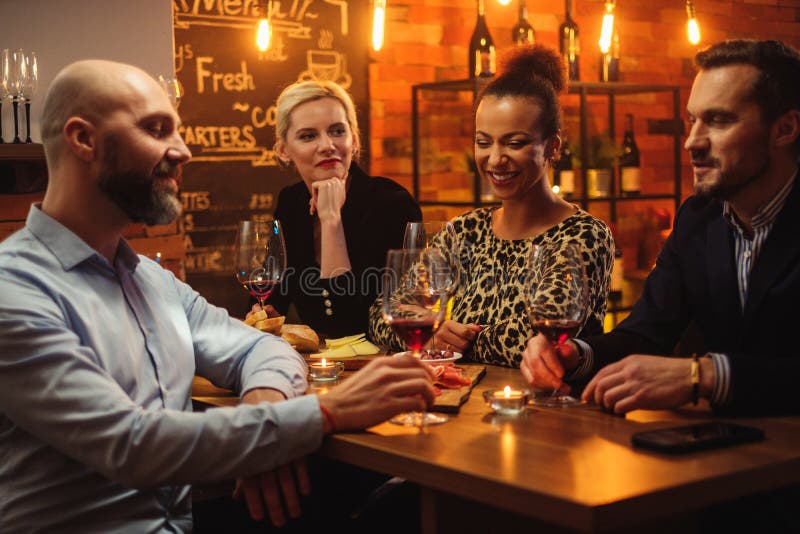 Group of Friends Having Fun Talk Behind Bar Counter in a Cafe Stock ...