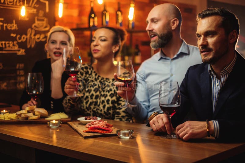 Group of Friends Having Fun Talk Behind Bar Counter in a Cafe Stock ...