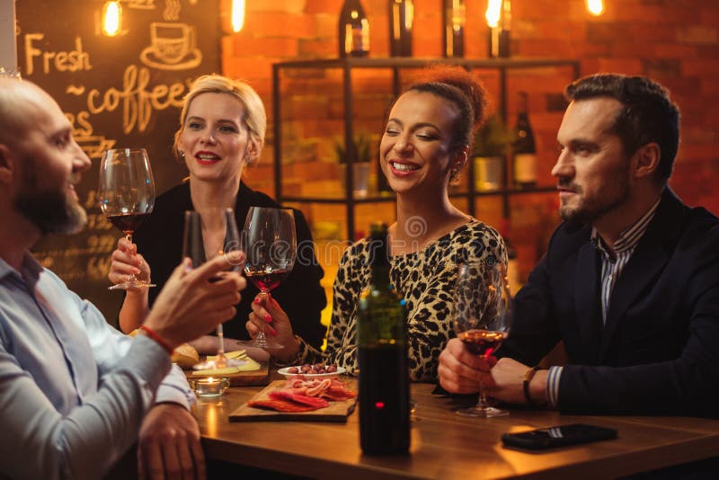 Group of Friends Having Fun Talk Behind Bar Counter in a Cafe Stock ...