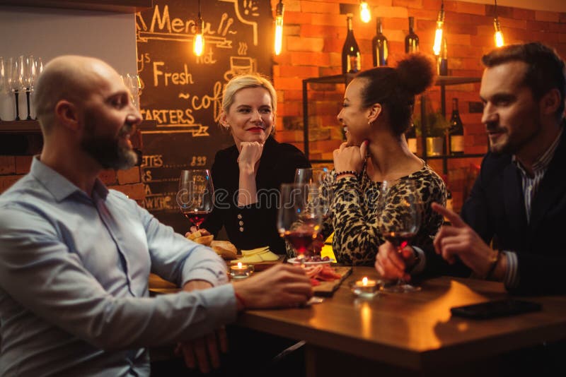 Group of Friends Having Fun Talk Behind Bar Counter in a Cafe Stock ...