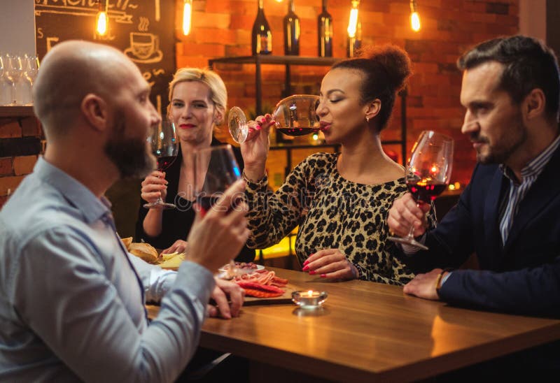 Group of Friends Having Fun Talk Behind Bar Counter in a Cafe Stock ...