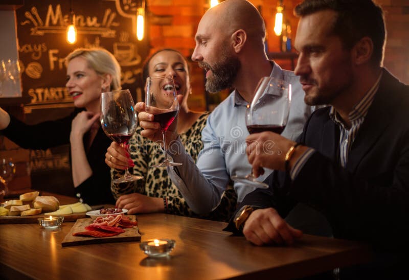 Group of Friends Having Fun Talk Behind Bar Counter in a Cafe Stock ...
