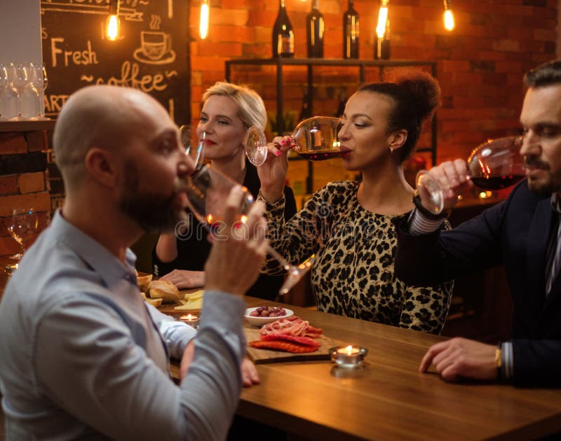 Group of Friends Having Fun Talk Behind Bar Counter in a Cafe Stock ...