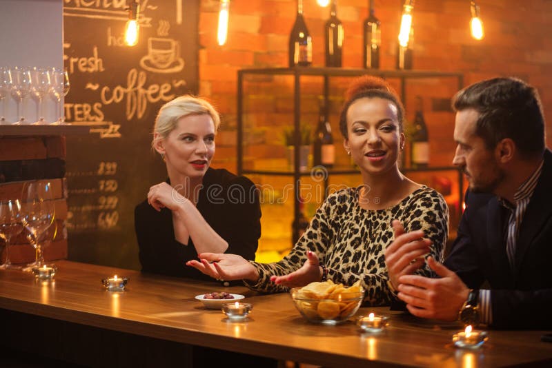Group of Friends Having Fun Talk Behind Bar Counter in a Cafe Stock ...