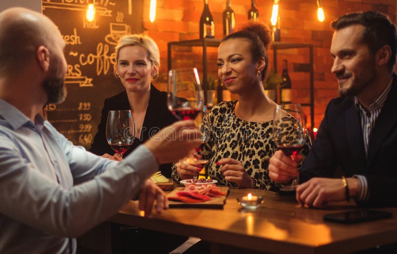 Group of Friends Having Fun Talk Behind Bar Counter in a Cafe Stock ...