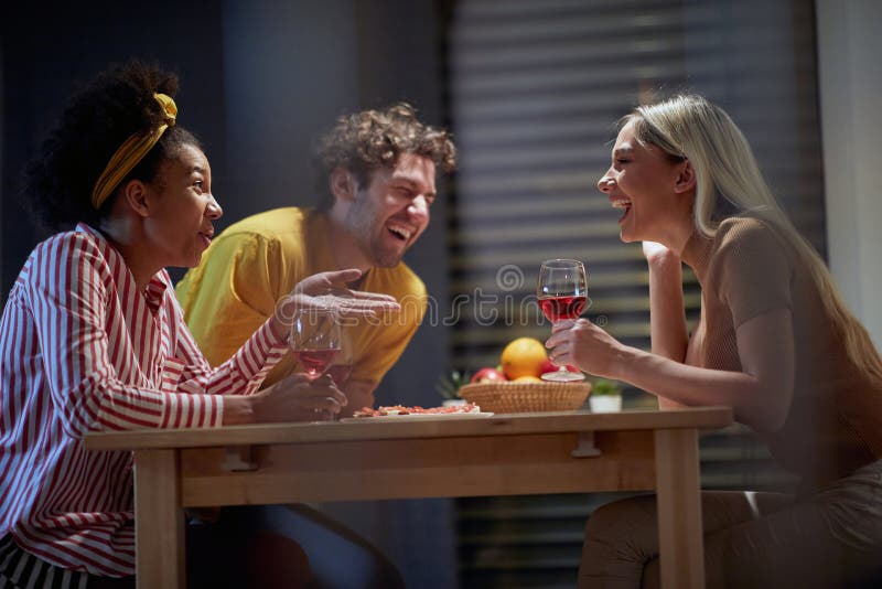 Group of Friends Having Home Gathering Stock Photo - Image of food ...