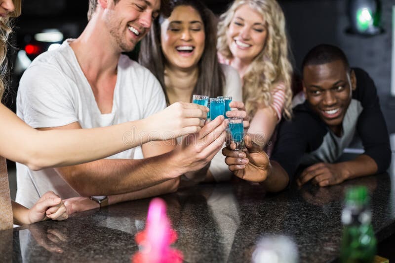 Group of Friends Having Shots Stock Photo - Image of affection ...