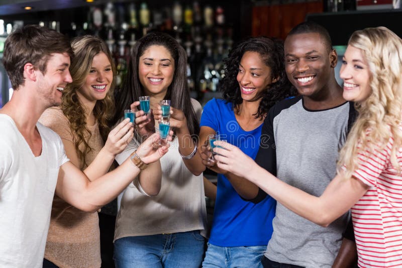 Group of Friends Having Shots Stock Image - Image of cheering ...