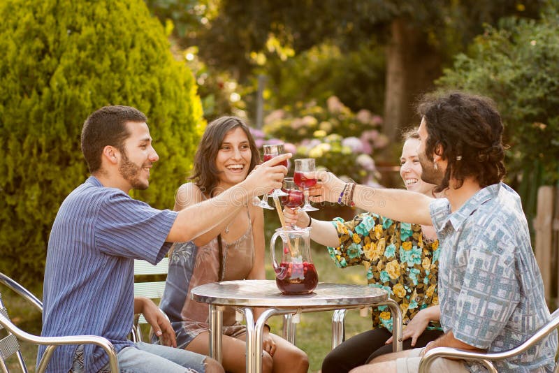 Group of Friends Having a Toast Stock Photo - Image of clink, cheerful ...
