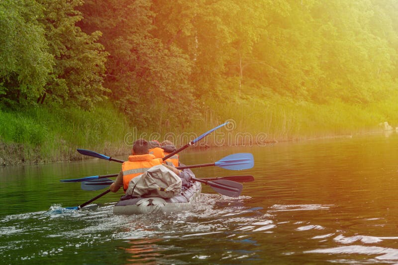 A Young Boy Sits at the Very Front of the Raft. Stock Image - Image of ...