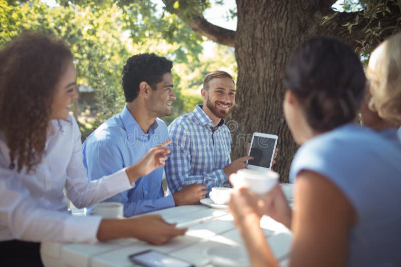 Friends Interacting with Each Other Stock Photo - Image of outdoors ...