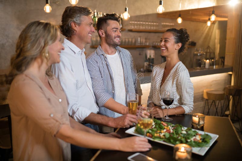 Group of Friends Interacting with Each Other Stock Image - Image of ...