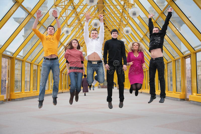 Group of Friends Jump on Footbridge Stock Image - Image of happy, girl ...