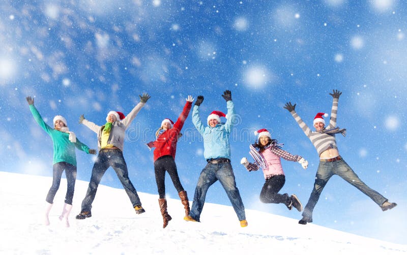 Group of Friends Jumping in the Snow Stock Image - Image of multi ...