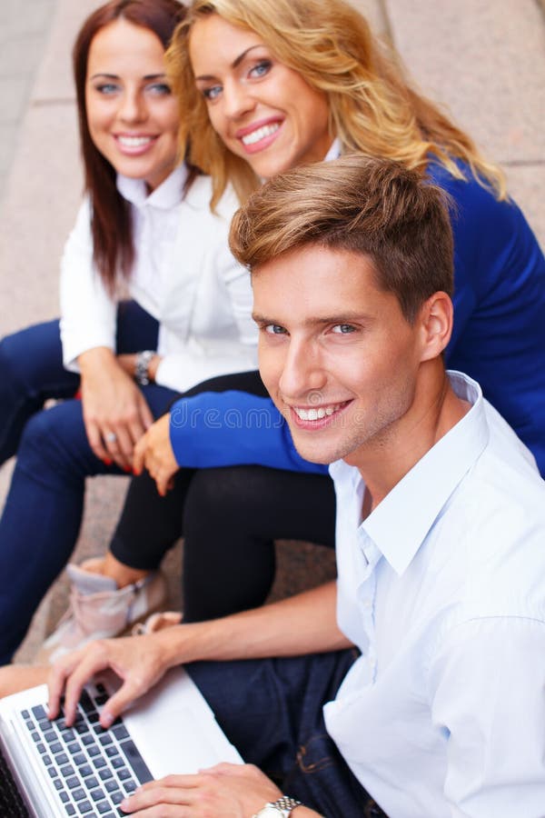 Group of Friends with Laptop Stock Image - Image of expression ...