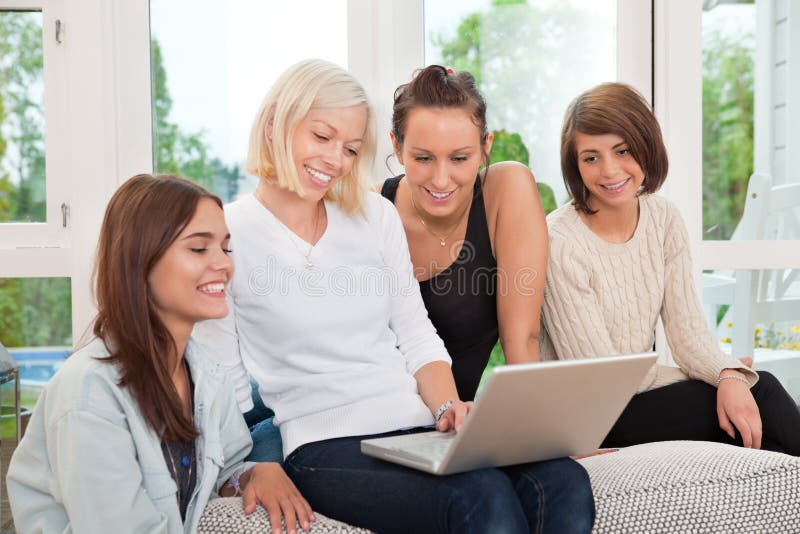 Group of Friends with Laptop Stock Photo - Image of leisure, cheerful ...