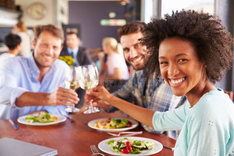 Group of Friends at Lunch in a Restaurant Stock Image - Image of ...