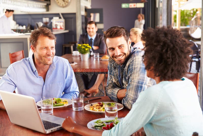 Group of Friends at Lunch in a Restaurant Stock Photo - Image of ...