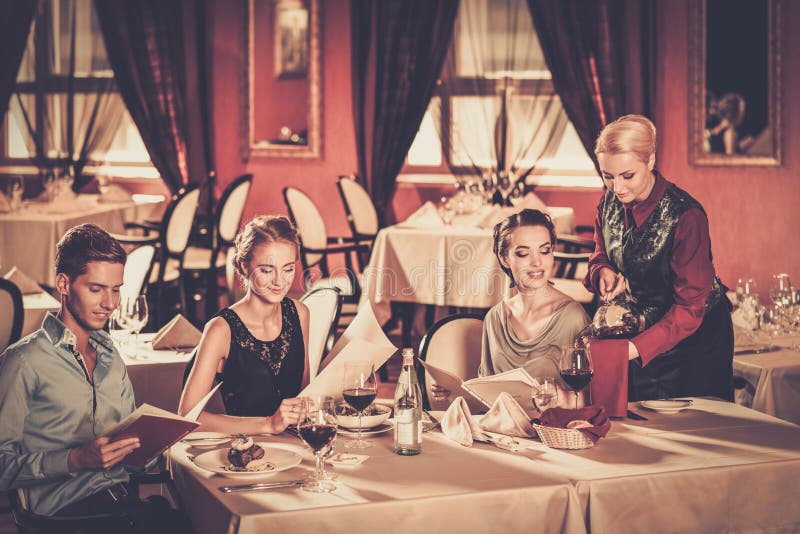 Group of Friends in a Luxury Restaurant Stock Photo - Image of ...