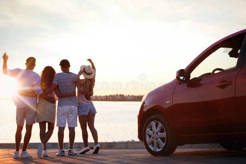 Group of Friends Near Car Outdoors at Sunset, Back View. Summer Trip ...