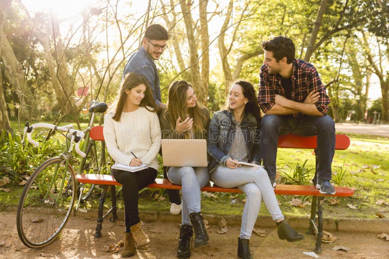 Students in the park stock image. Image of college, hangout - 174423909
