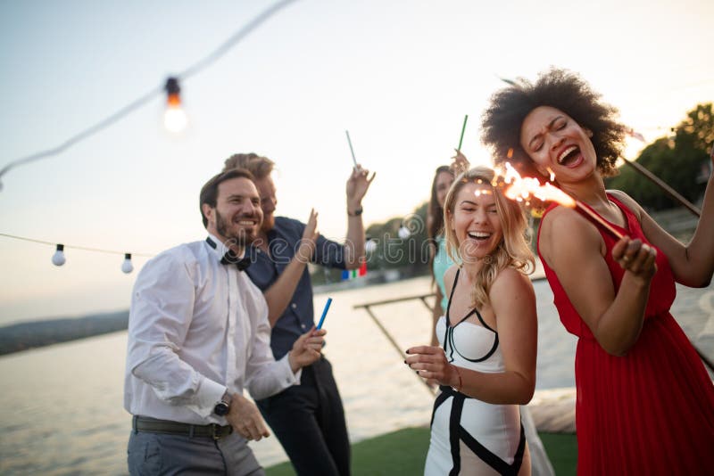 Group of Friends at Party Dancing and Smiling Together Stock Image ...