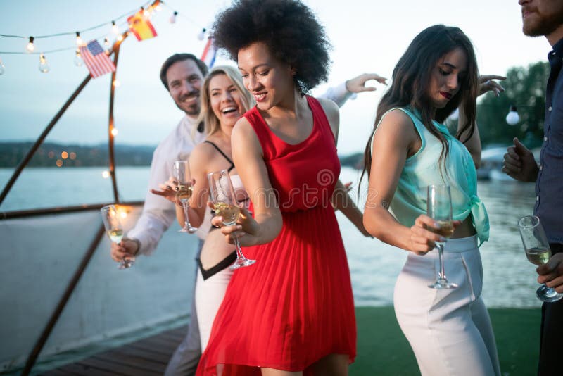 Group of Friends at Party Dancing and Smiling Together Stock Image ...