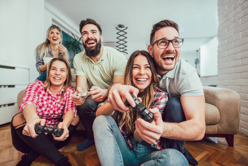 Group of Friends Play Video Games Together. Stock Photo - Image of ...