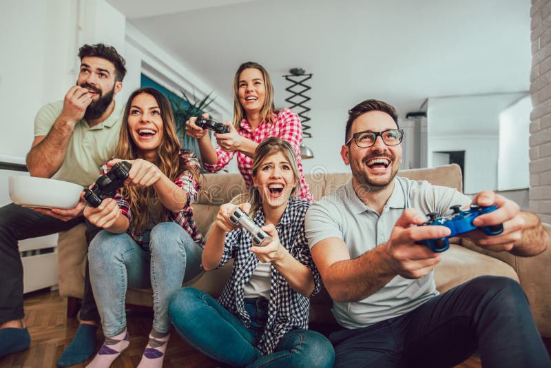 Group of Friends Play Video Games Together at Home Stock Photo - Image ...