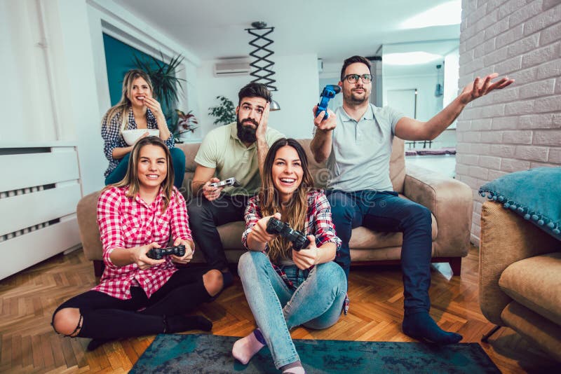 Group of Friends Play Video Games Together at Home Stock Image - Image ...