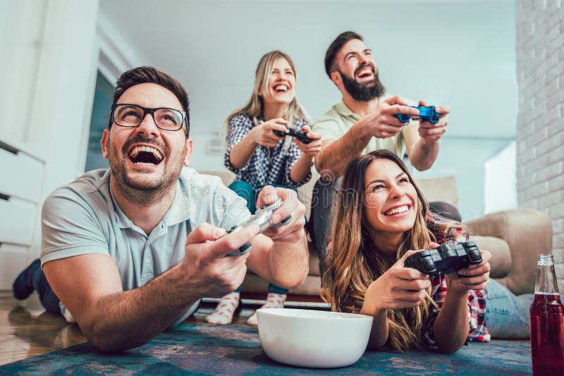 Group of Friends Play Video Games Together at Home Stock Photo - Image ...