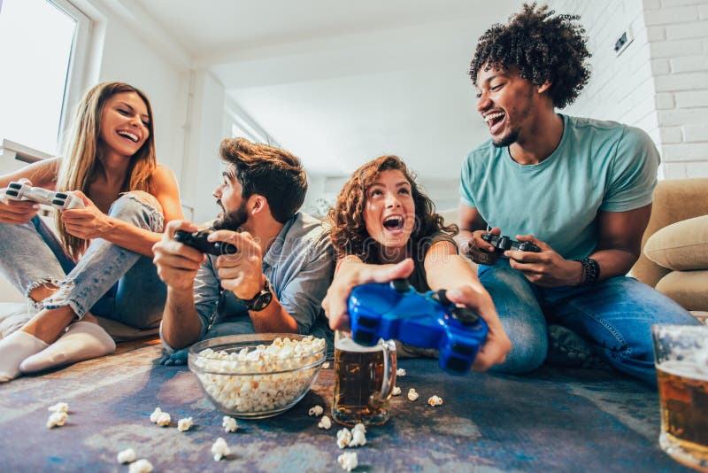 Group of Friends Play Video Games Together at Home Stock Image - Image ...