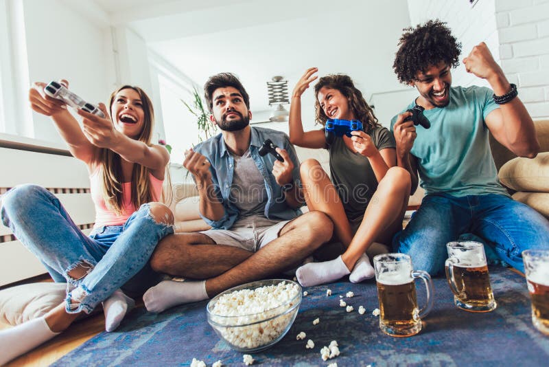 Friends Play Video Games Together at Home, Having Fun Stock Image ...