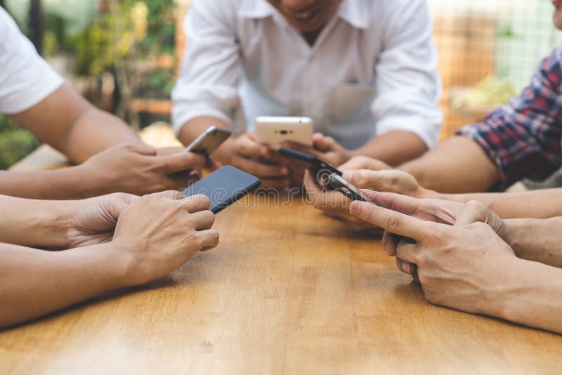 Group of Friends Playing App Games in Mobile Phone and Online Together ...