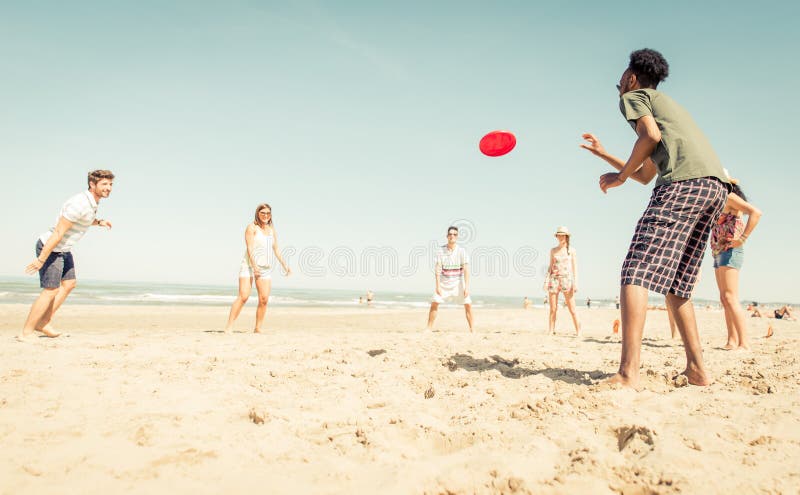Group of Friends Playing with Frisbee Stock Photo - Image of boyfriend ...